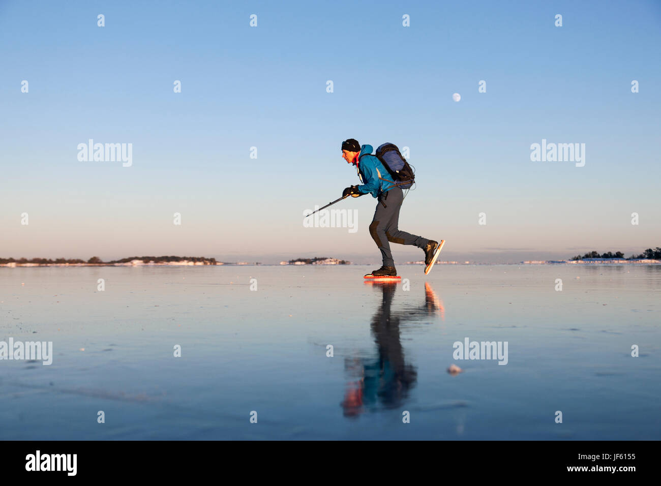 Man long-distance skating Stock Photo - Alamy