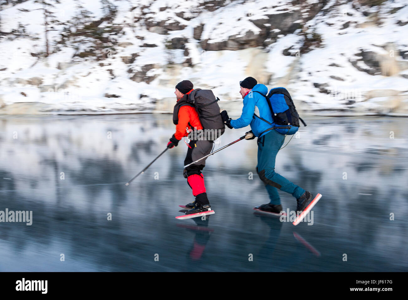 Men long-distance skating Stock Photo - Alamy