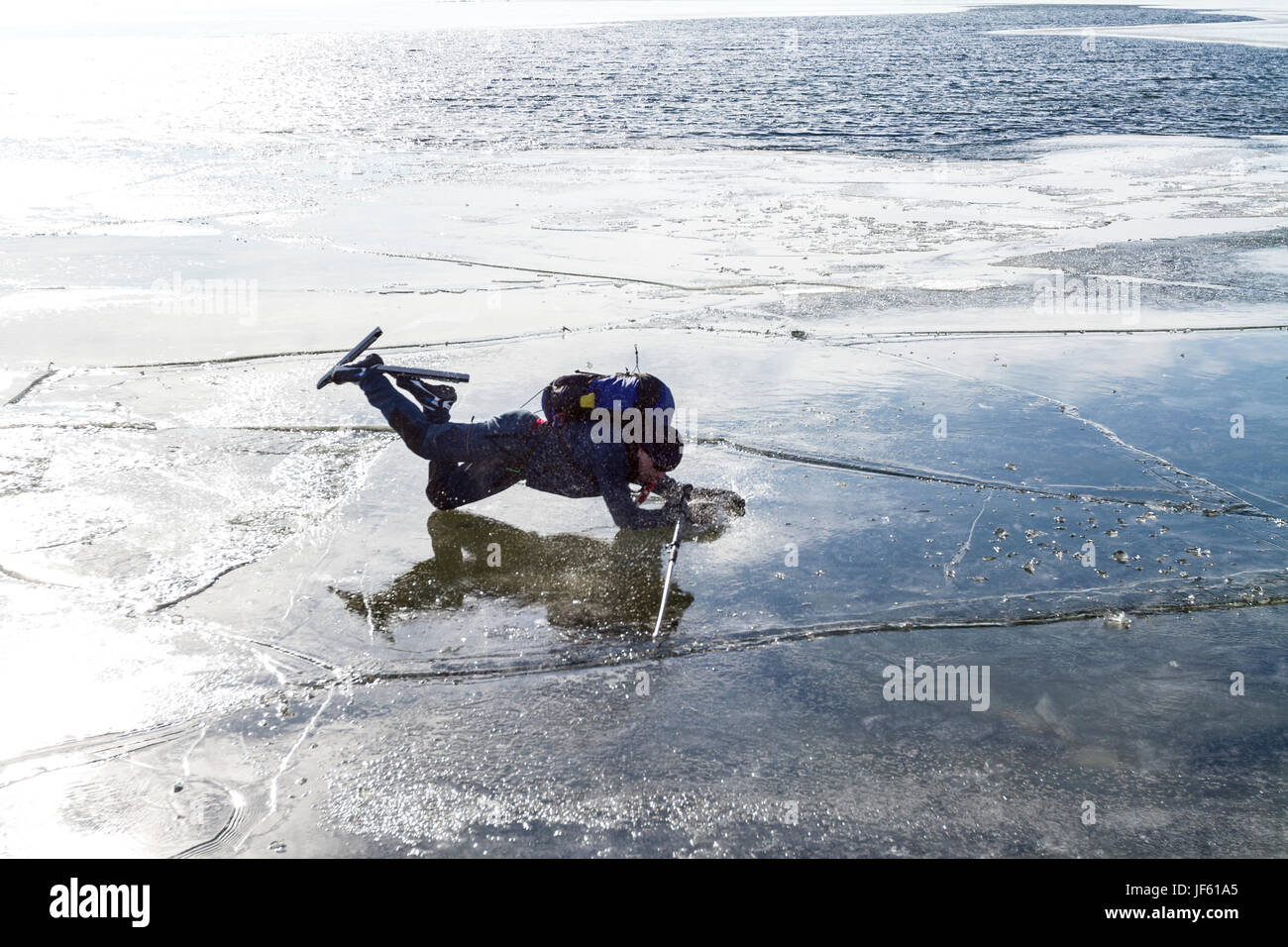 Falling while long distance skating Stock Photo - Alamy