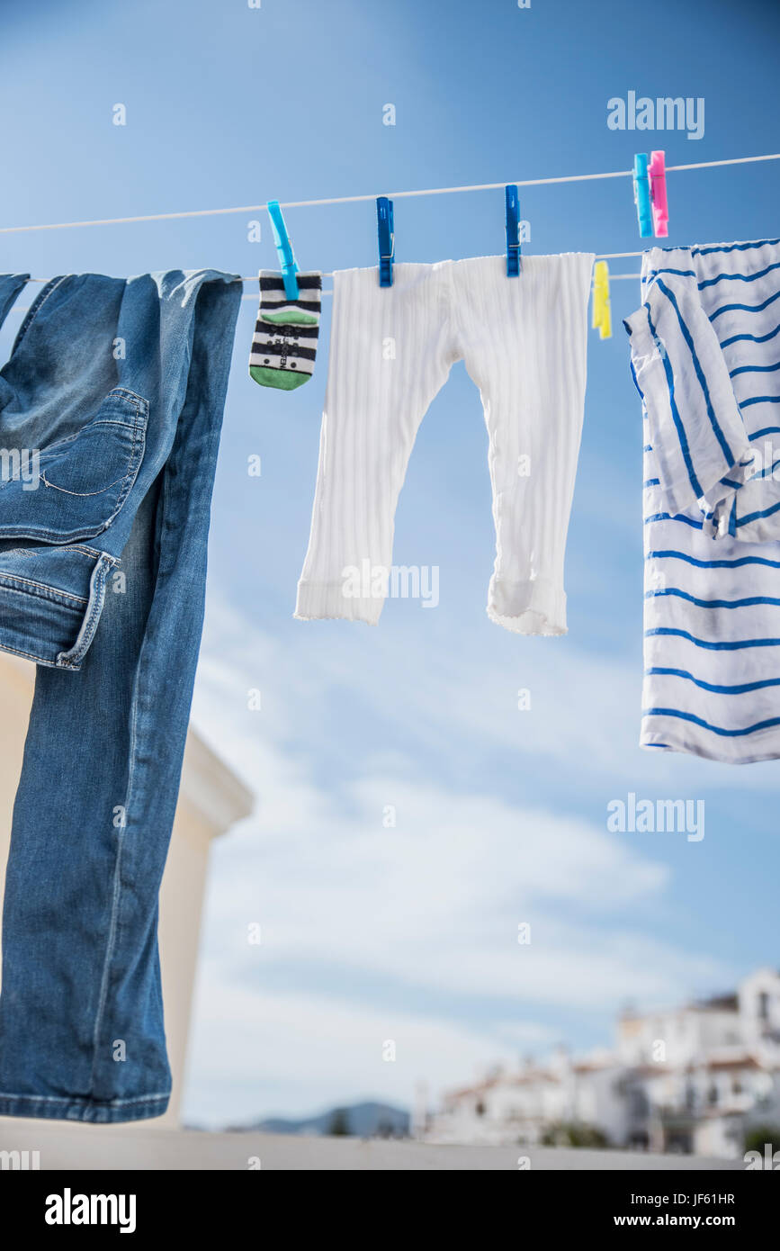 Laundry on balcony Stock Photo - Alamy