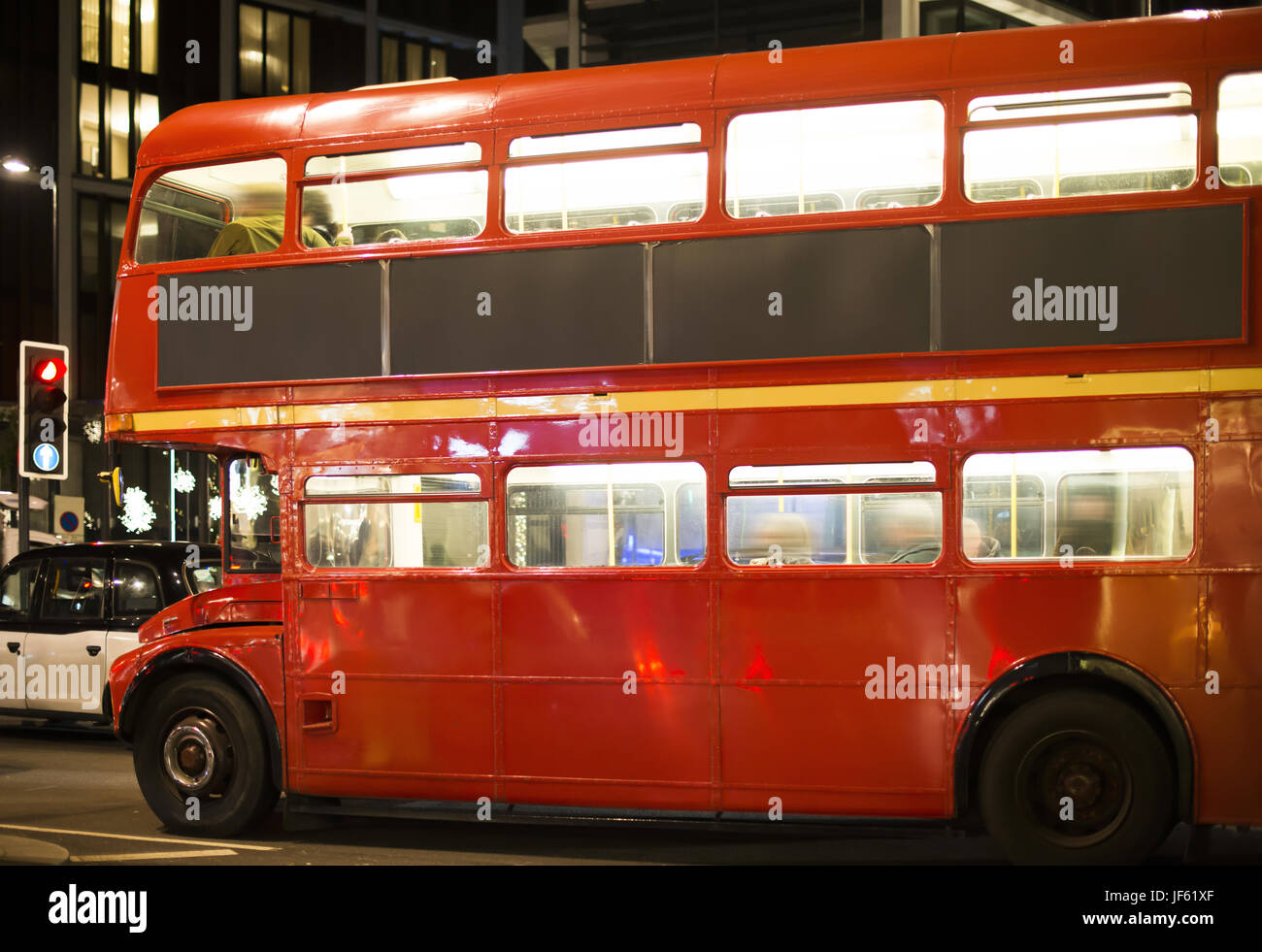 Red vintage bus in London Stock Photo - Alamy