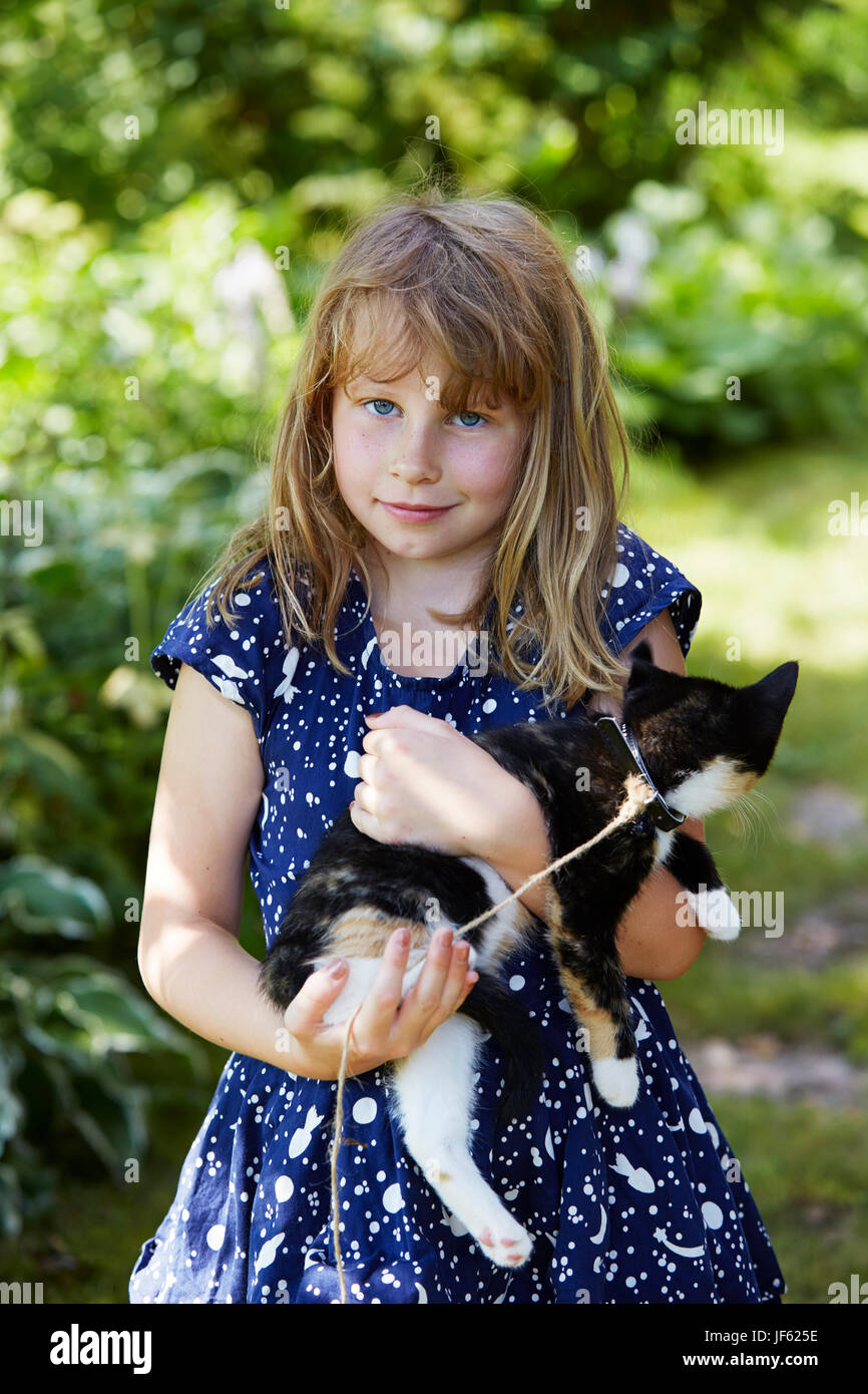 Girl with cat Stock Photo - Alamy