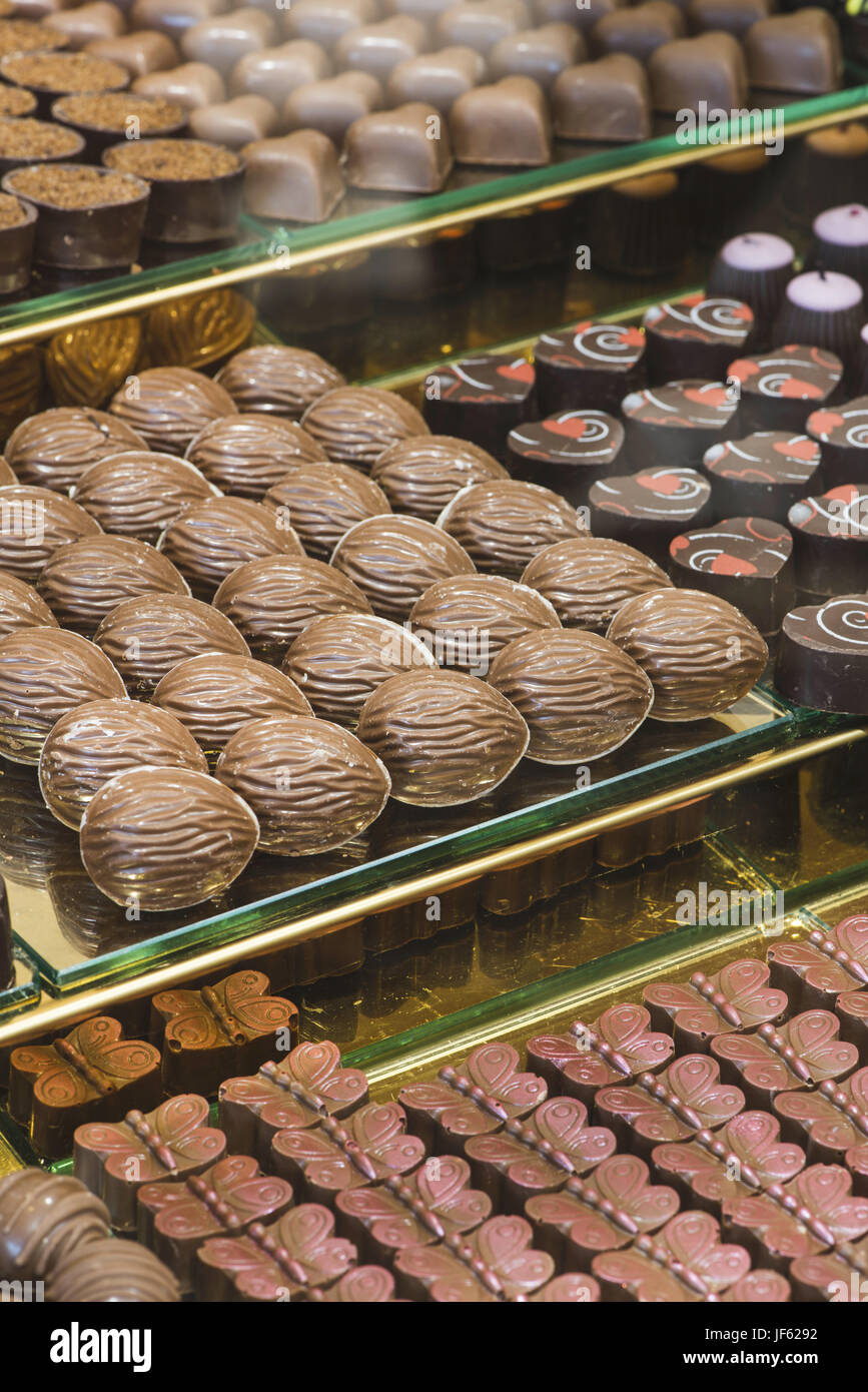 Chocolate candy in a store window Stock Photo - Alamy