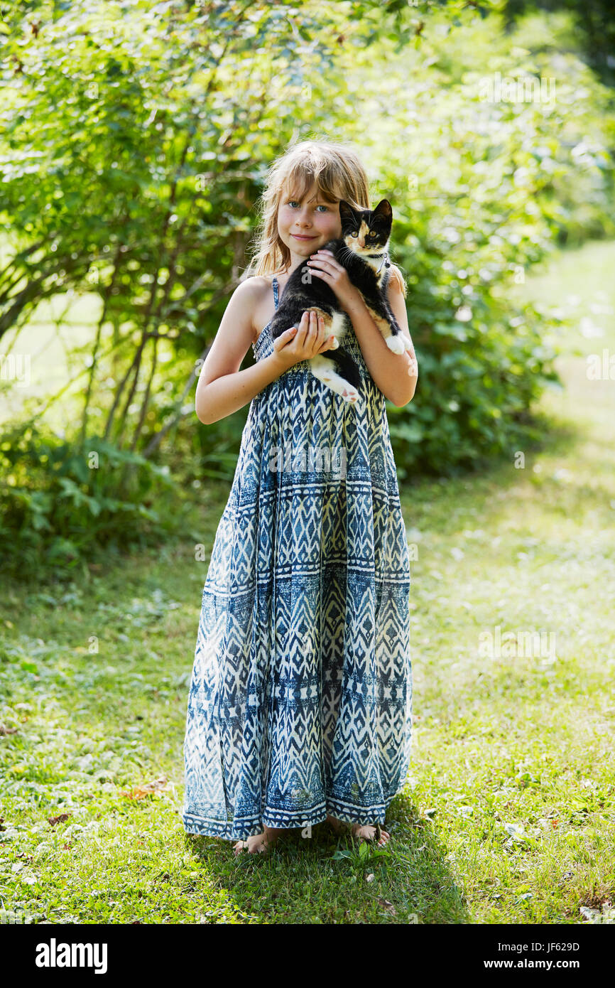 Girl with cat Stock Photo - Alamy