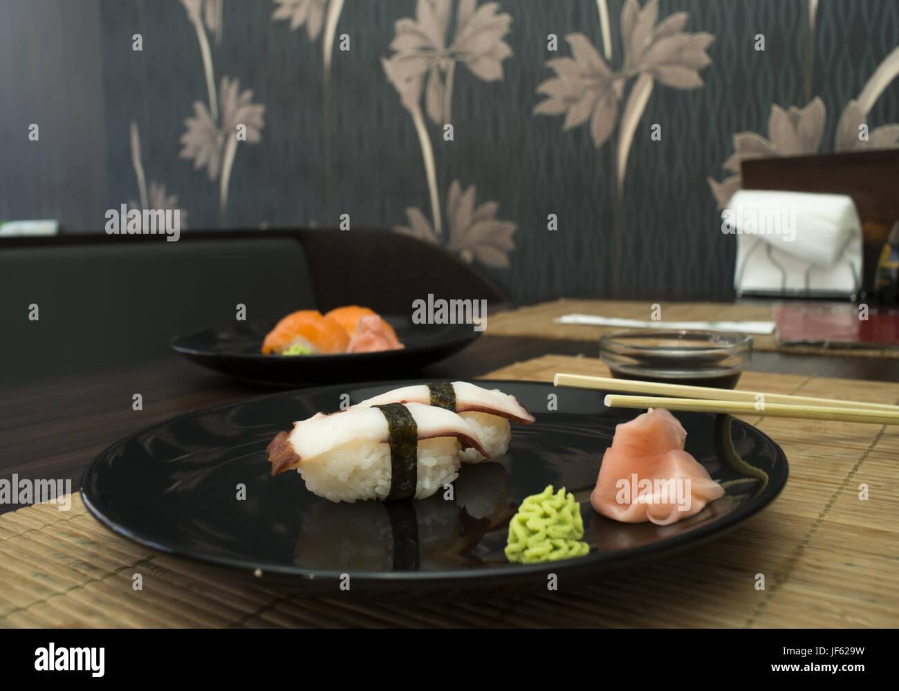 Sushi in sushi bar Stock Photo - Alamy