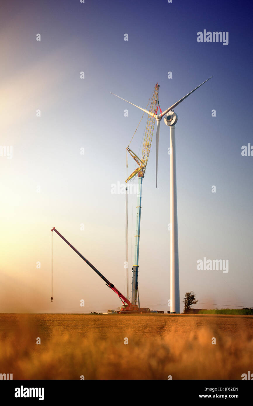 Crane installing wind turbine Stock Photo - Alamy