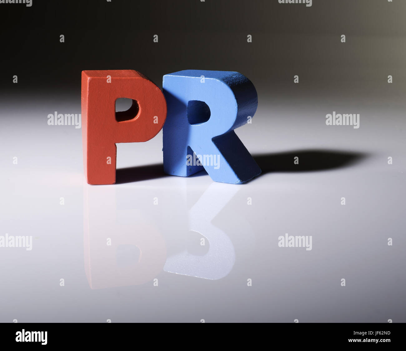 Multicolored word PR made of wood Stock Photo - Alamy