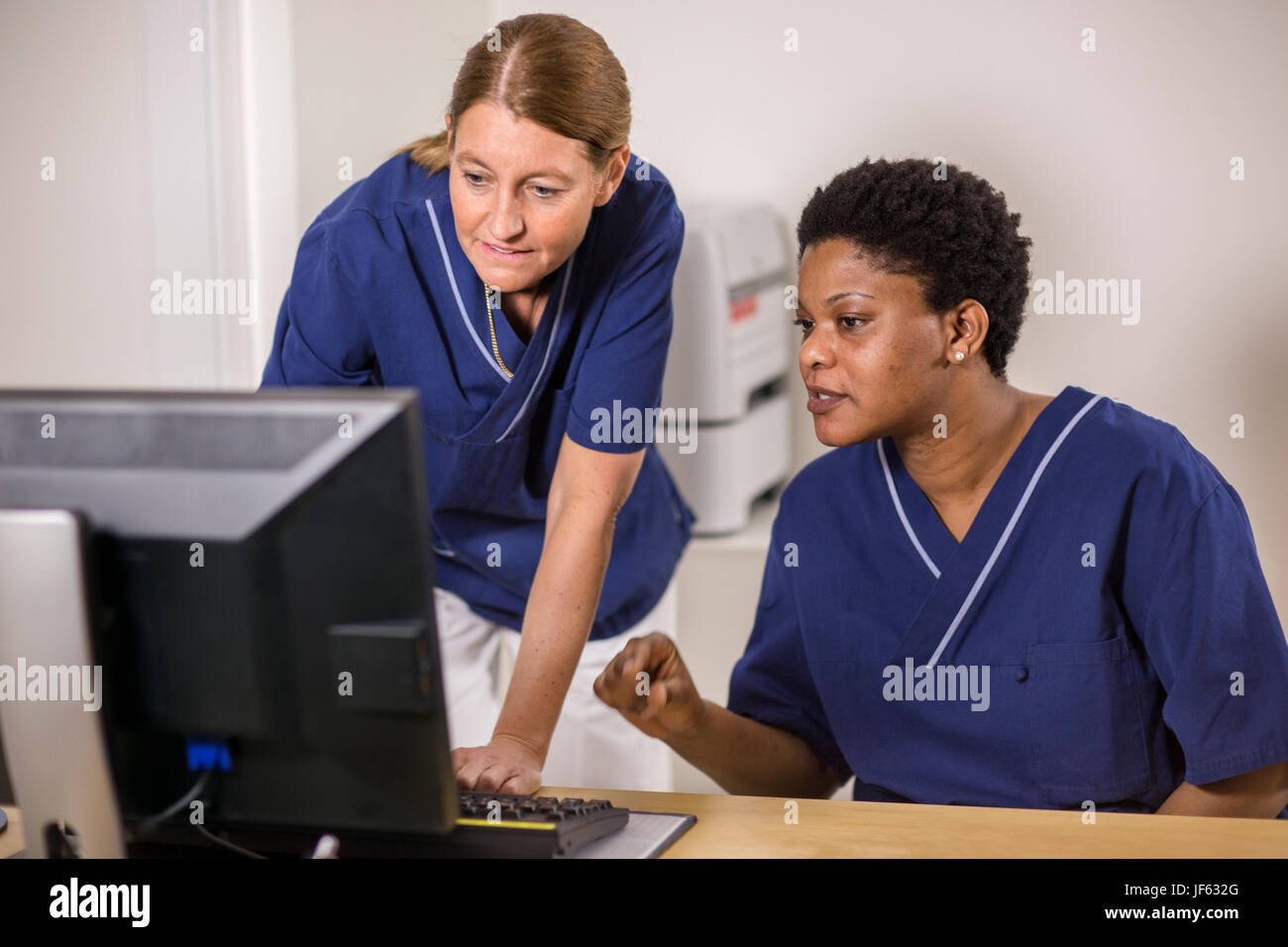 Female administration staff hi-res stock photography and images - Alamy