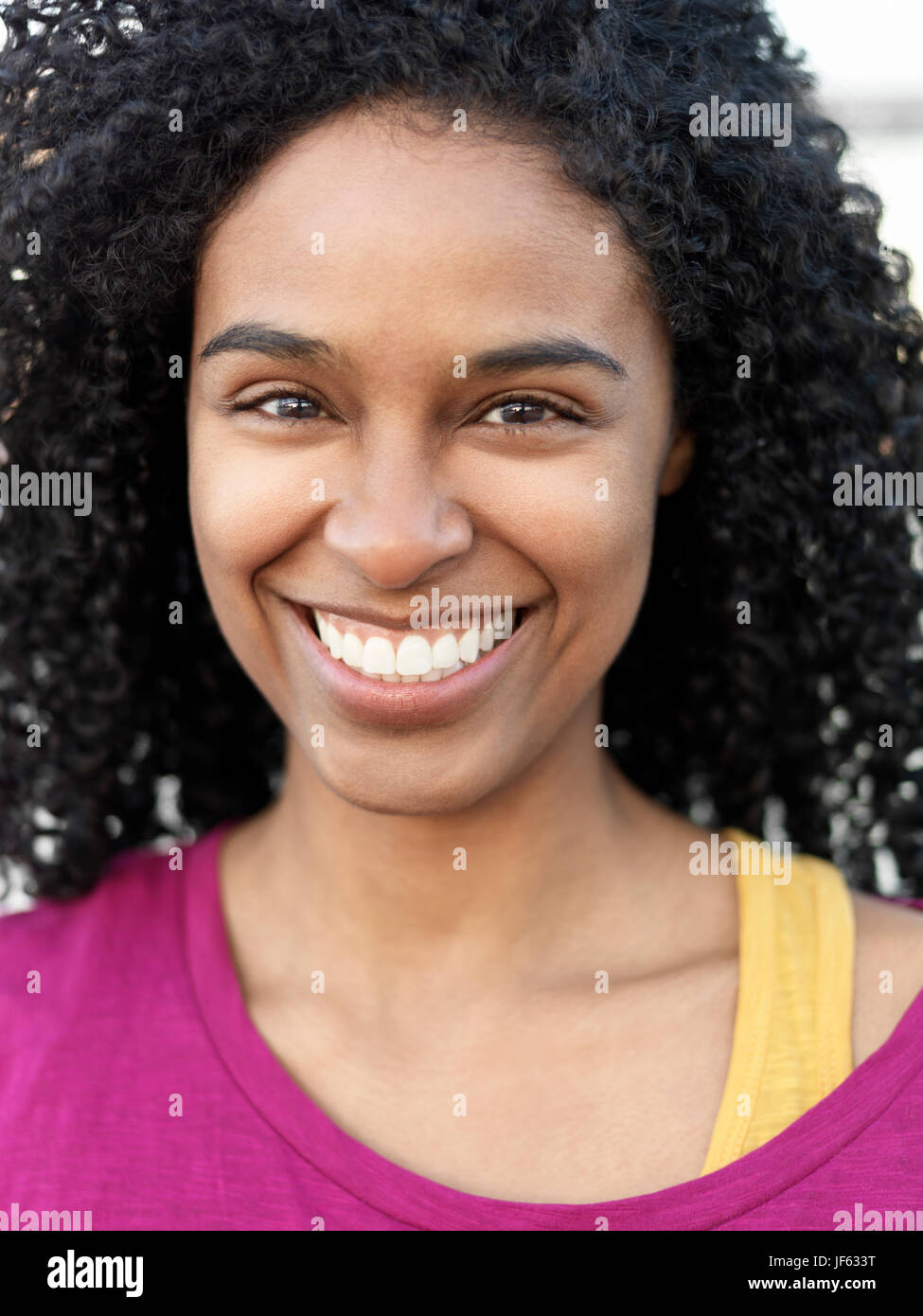 Portrait of smiling woman Stock Photo - Alamy