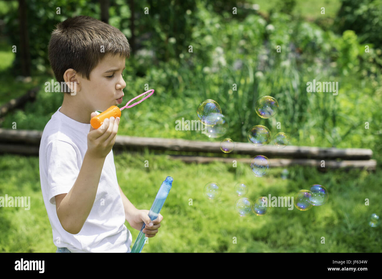 Child makes bubbles Stock Photo - Alamy