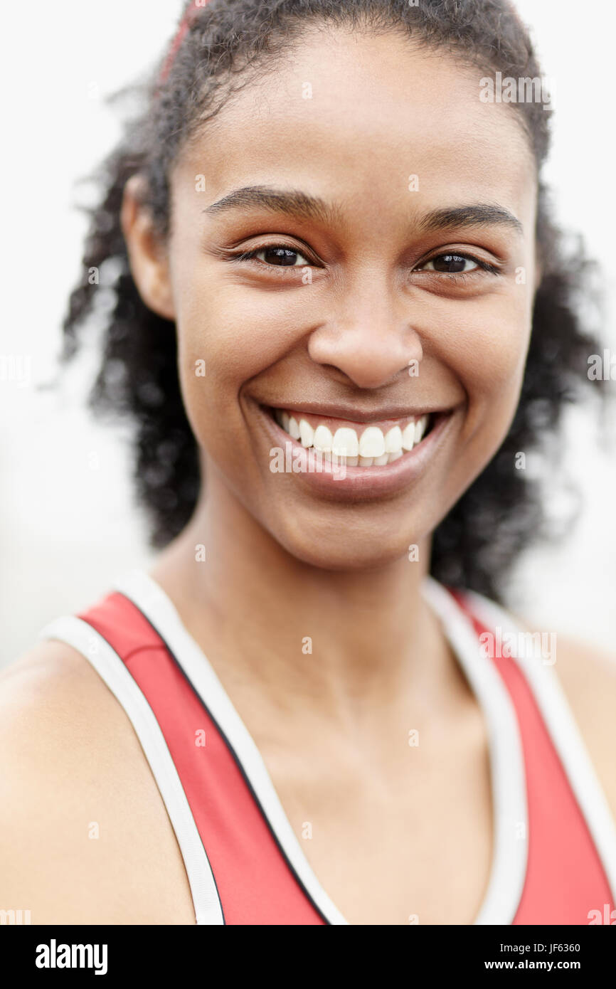 Portrait of smiling woman Stock Photo - Alamy