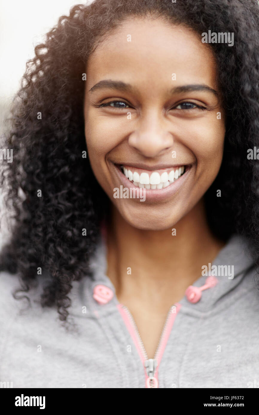 Portrait of smiling woman Stock Photo - Alamy