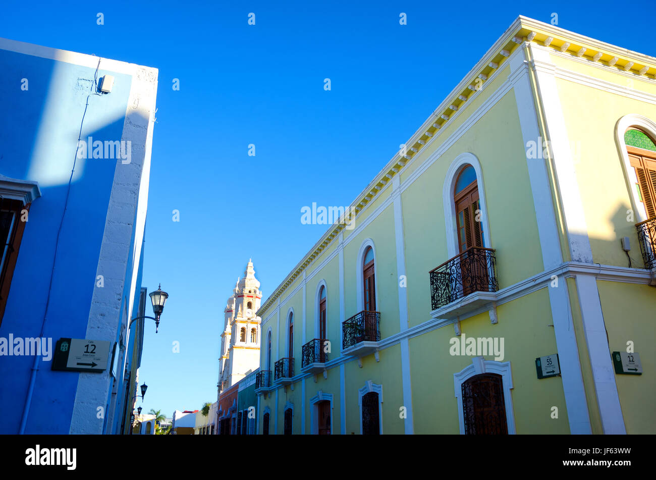 Colonial street corner in Campeche, Mexico with a beautiful blue sky ...