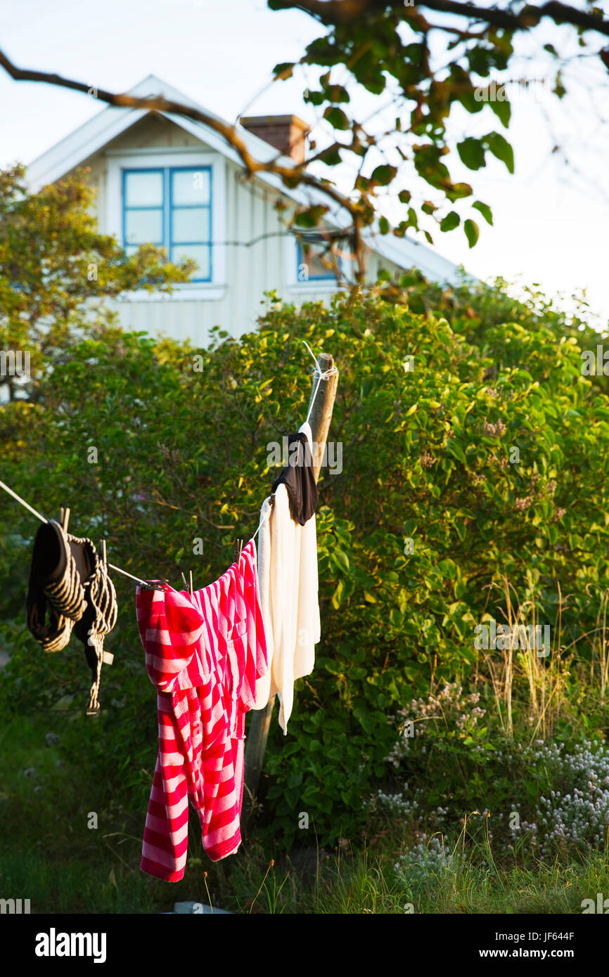 Laundry hanging on clothes line Stock Photo - Alamy