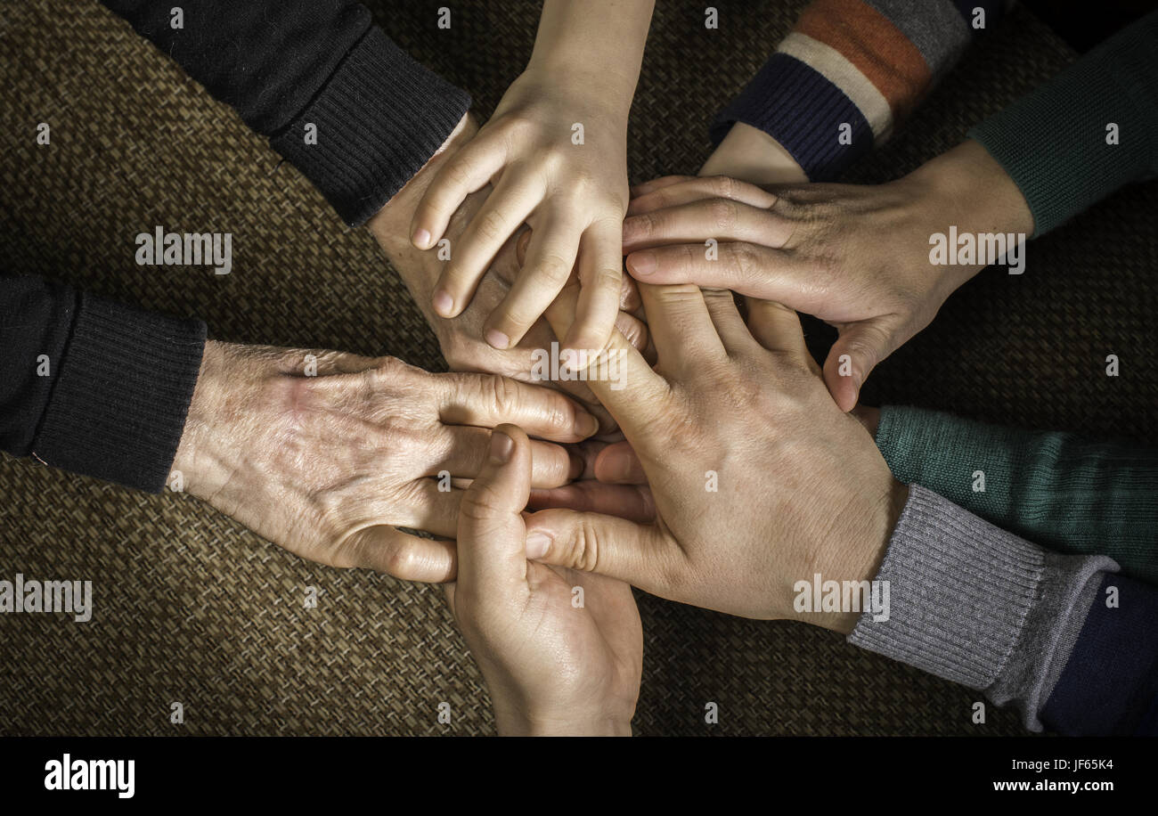 Many hands helping hi-res stock photography and images - Alamy