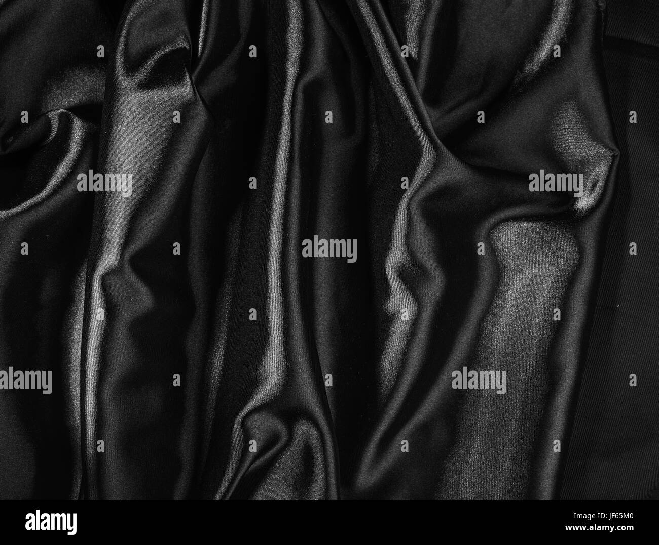 Shiny black satin fabric Stock Photo - Alamy