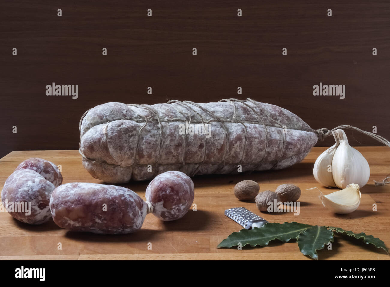 Salami with scene hunters 3 Stock Photo - Alamy