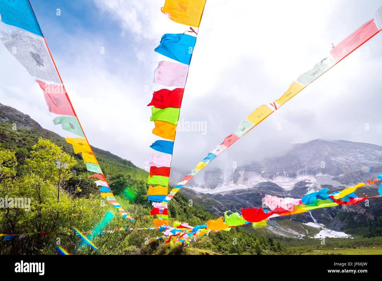 Prayer flags at the mountain in Yading, China Stock Photo - Alamy