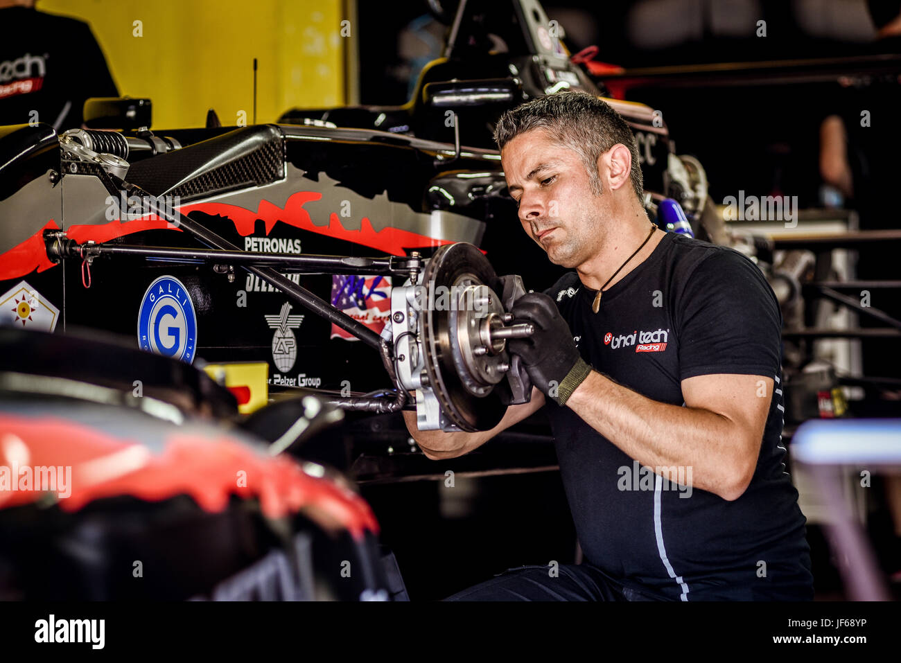 Italian Formula 4 championship, Bhaitech team car in pit workshop ...