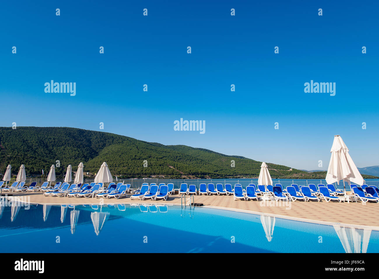 Swimming pool on bright summer day Stock Photo - Alamy