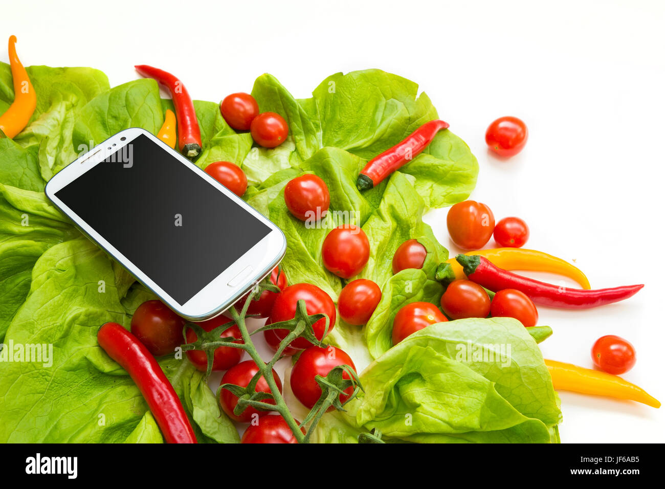 Vegetables and a Smartphone Stock Photo - Alamy