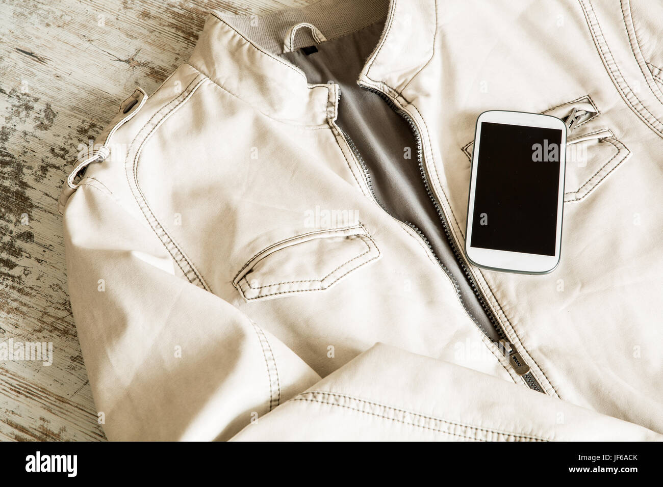 Smartphone and a Jacket Stock Photo - Alamy