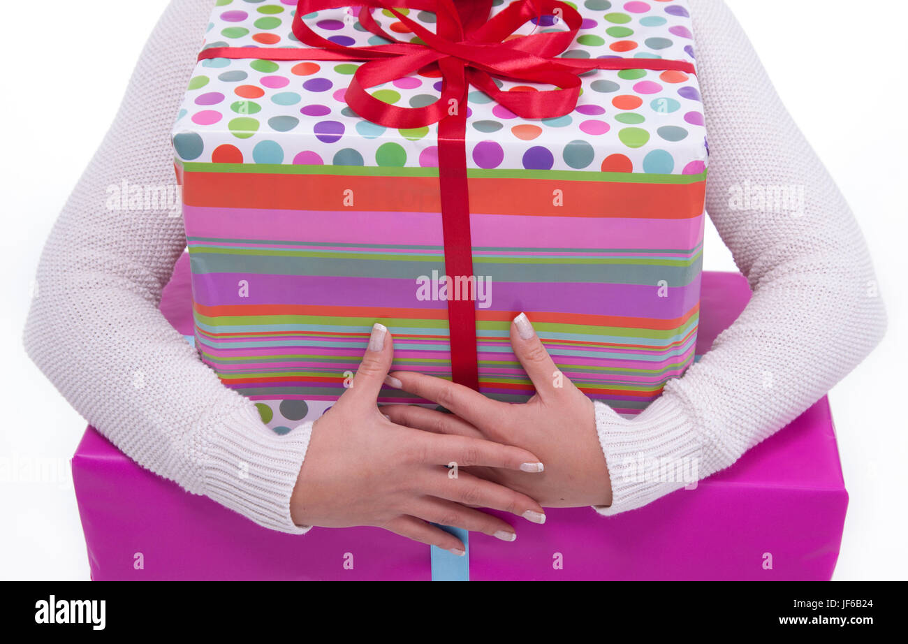 Woman surprised at receiving a gift Stock Photo - Alamy