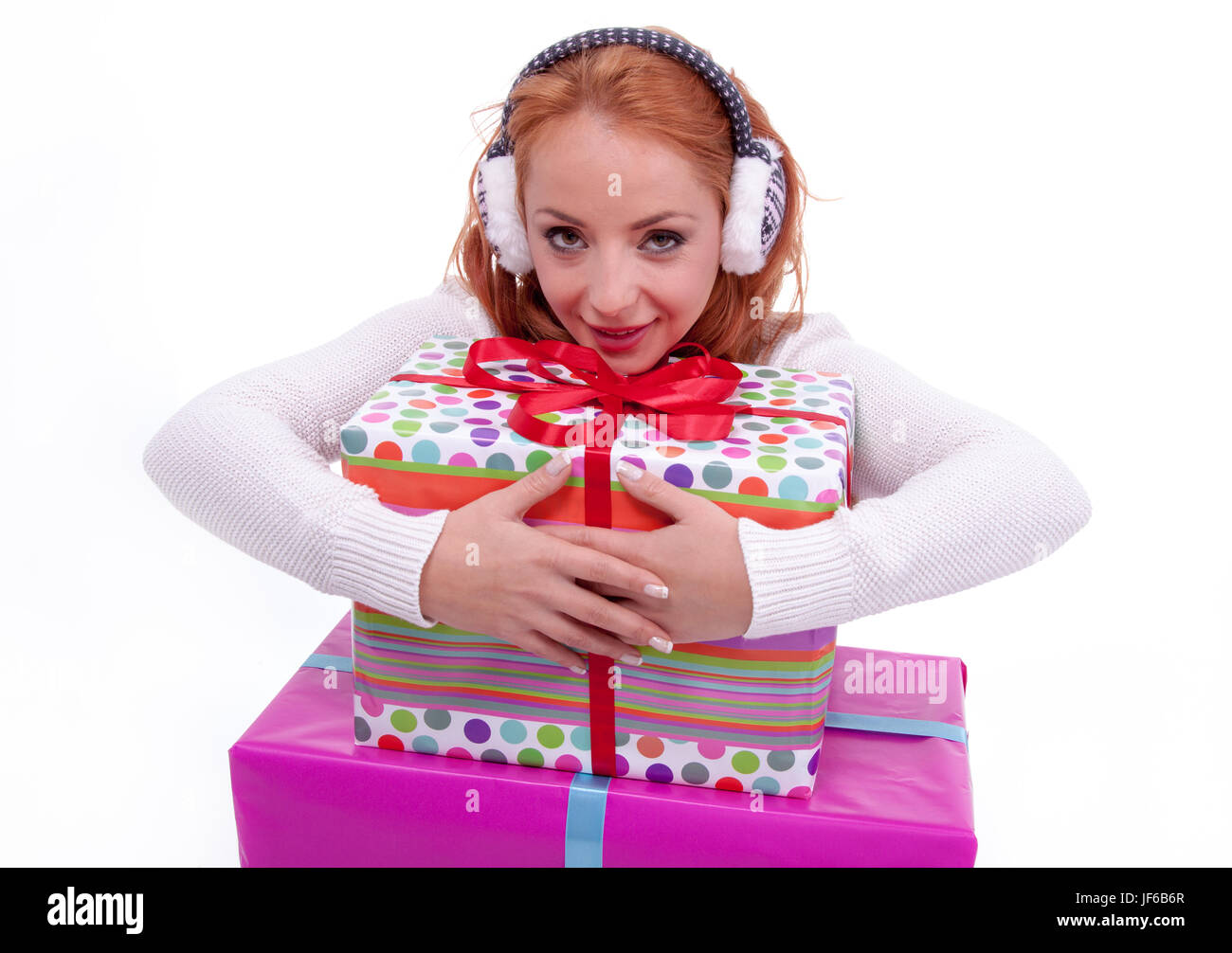 Woman surprised at receiving a gift Stock Photo - Alamy