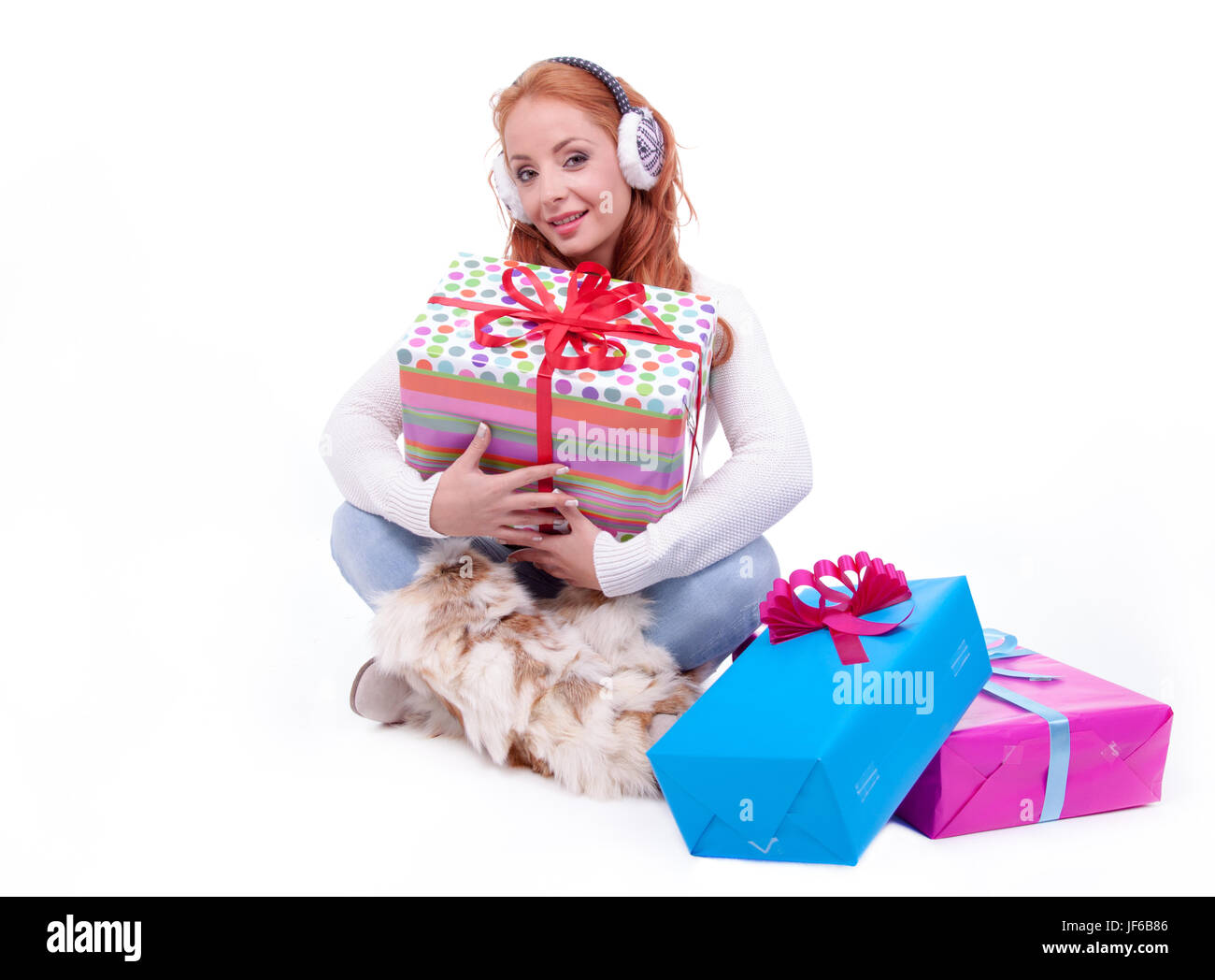 Woman surprised at receiving a gift Stock Photo - Alamy