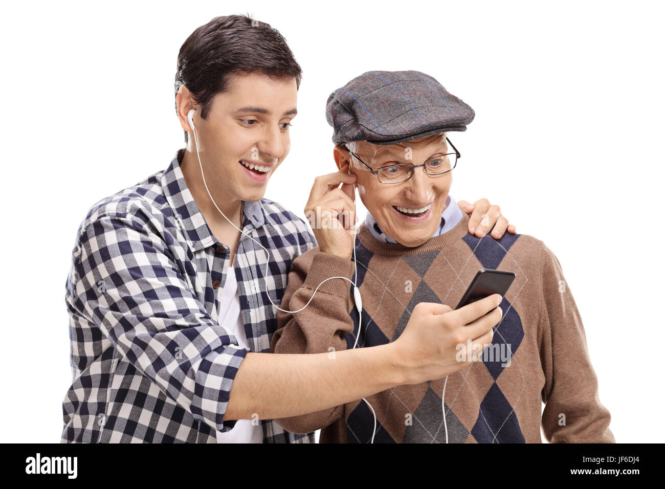 Grandson Listening To Music On A Phone With His Grandfather Isolated On
