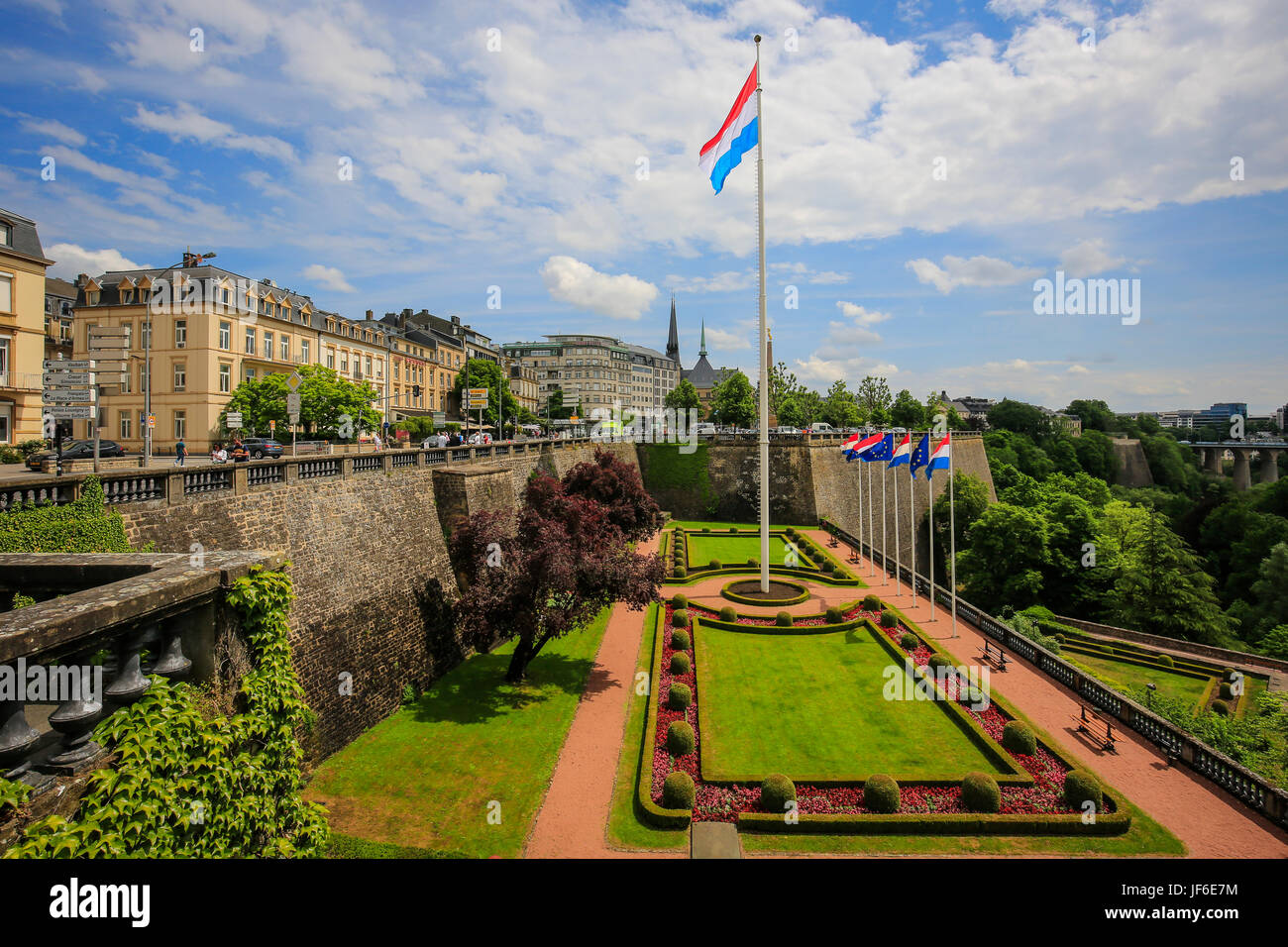 Luxembourg national flag in the Park at the place de la Constitution ...
