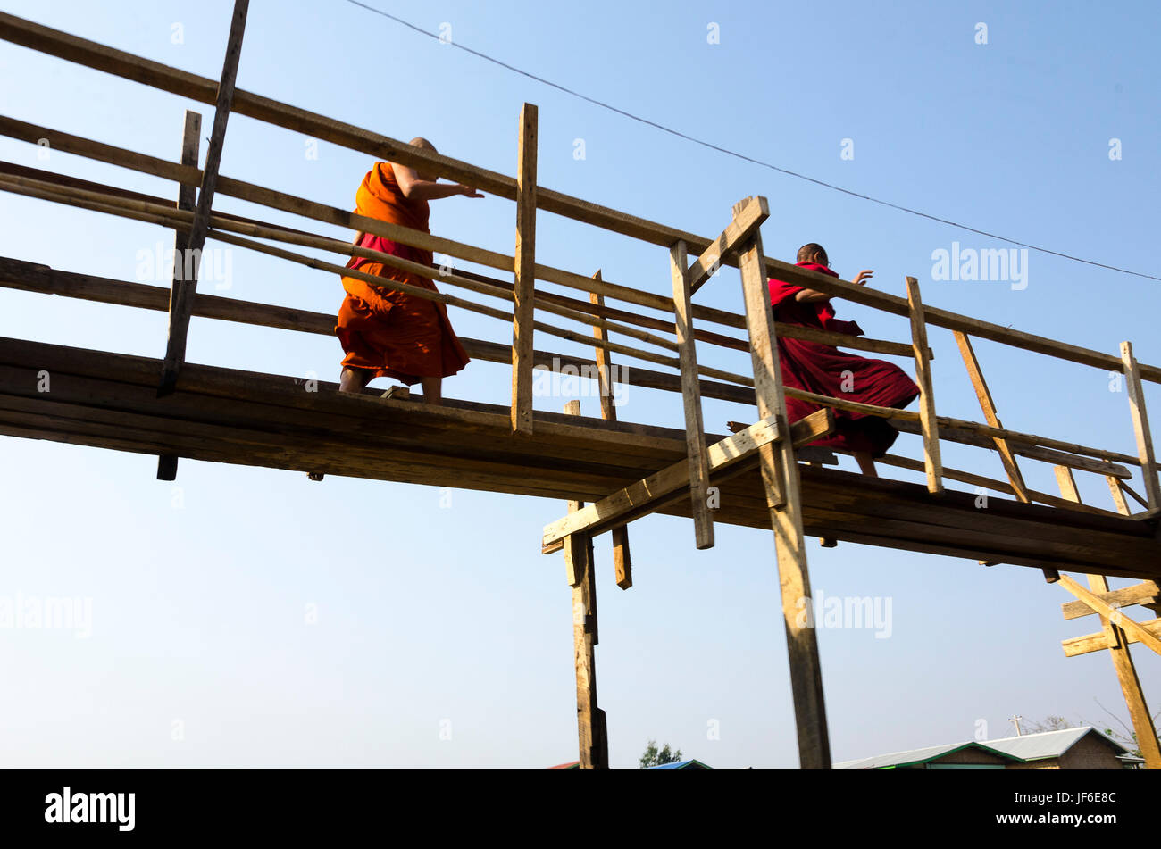 Bridge footbridge myanmar monk crossing hi-res stock photography and ...