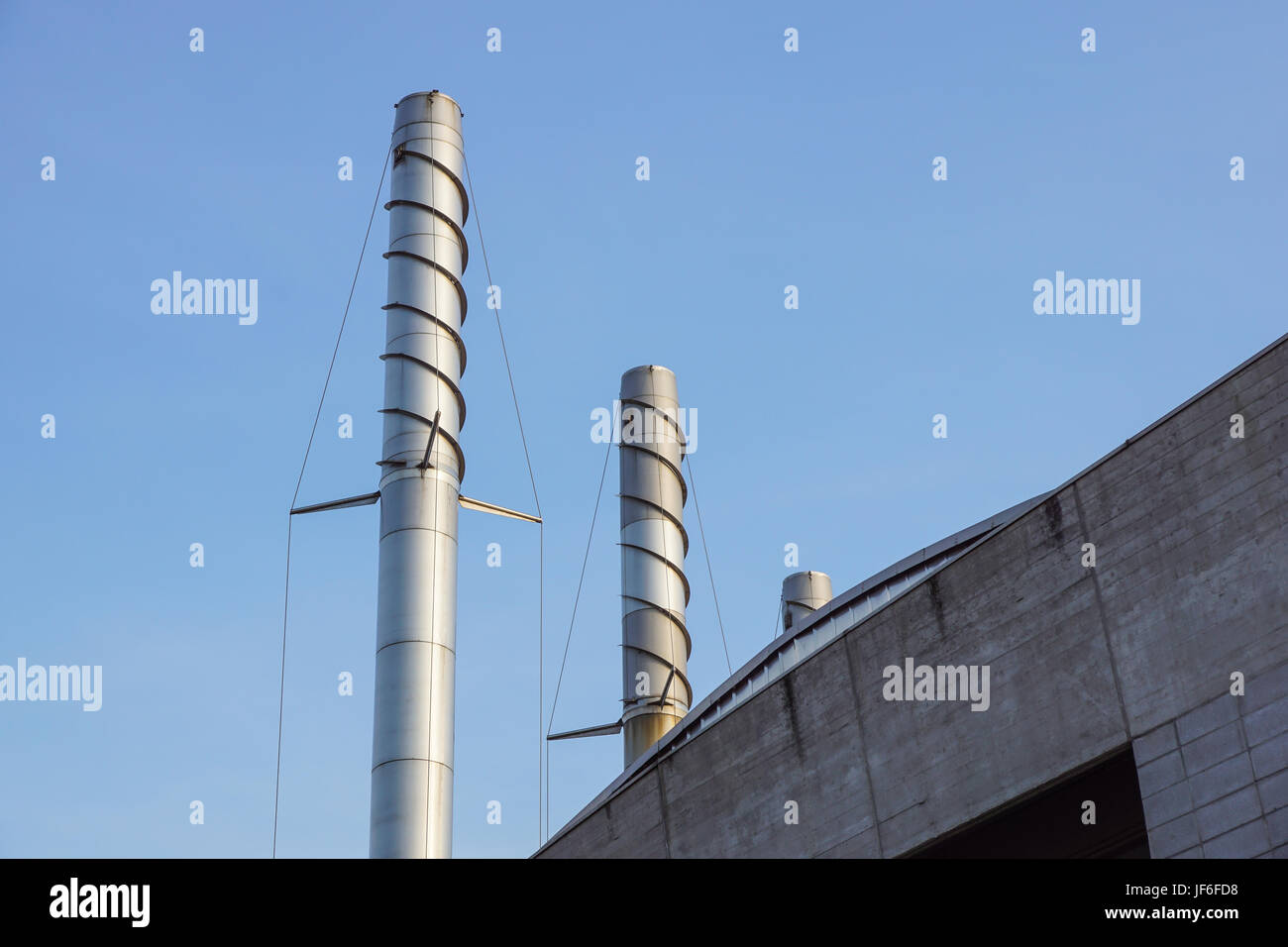 Thermal power stations and power lines chimney tower Stock Photo - Alamy