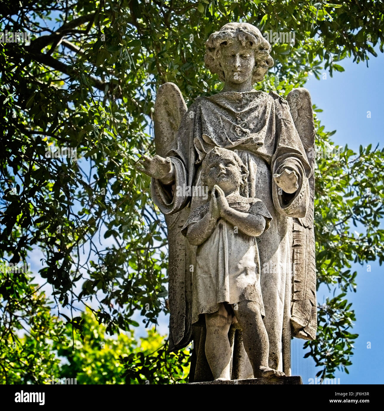 New Orleans, LA USA - Jun 2, 2017 - Boy and Angel on top of a Tomb ...