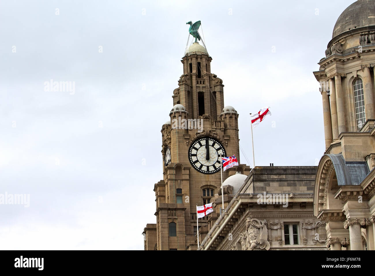 Liver Buildings with flags of St George flying in Liverpool UK Stock ...