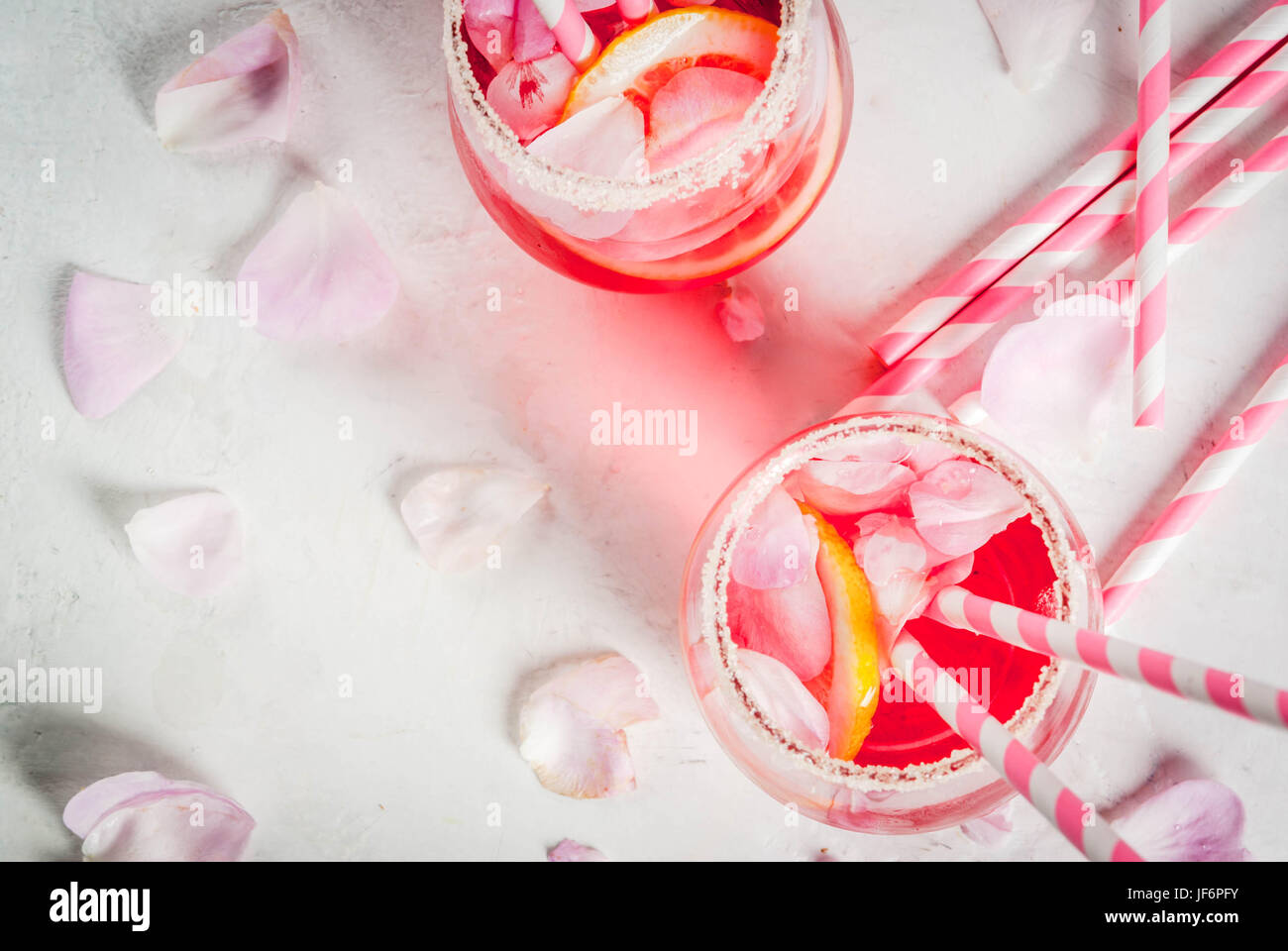 Summer refreshment drinks. Light pink rose cocktail, with rose wine ...