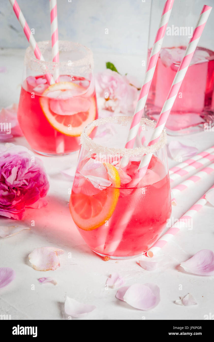 Summer refreshment drinks. Light pink rose cocktail, with rose wine ...