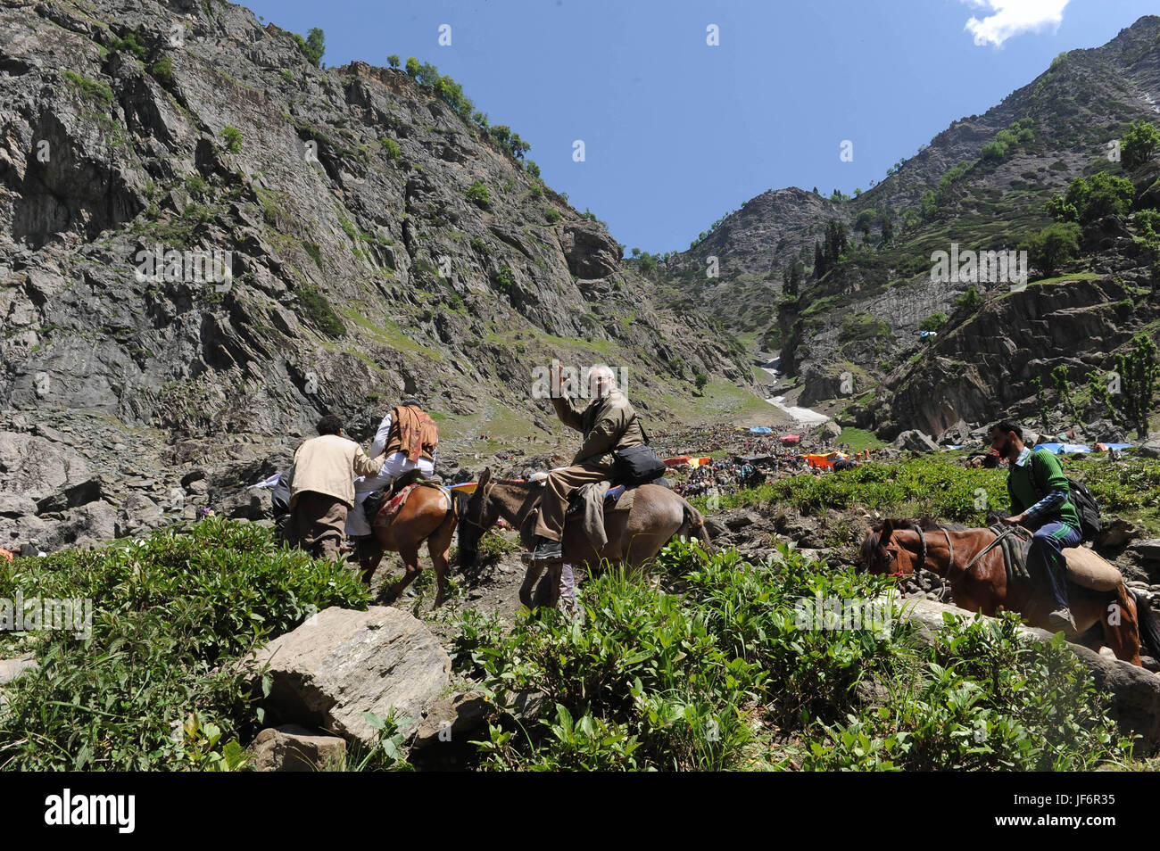 Pilgrim sitting on horse, amarnath yatra, jammu Kashmir, India, asia ...