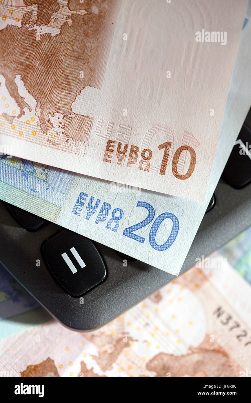 Euro Notes with a Calculator Stock Photo - Alamy
