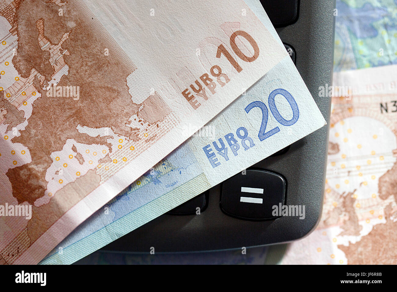 Euro Notes with a Calculator Stock Photo - Alamy