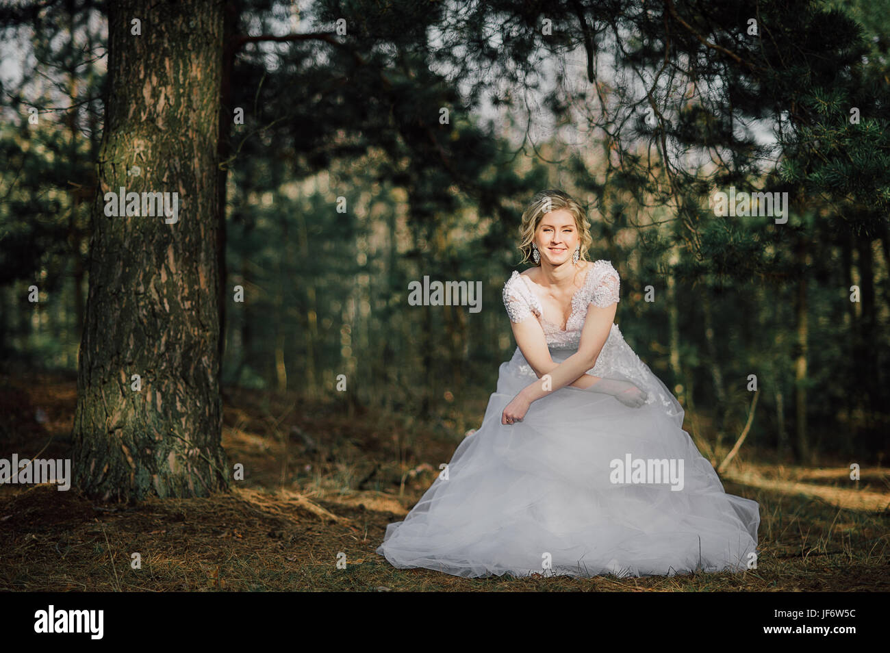 Beautiful bride woman portrait with bridal bouquet posing in her ...