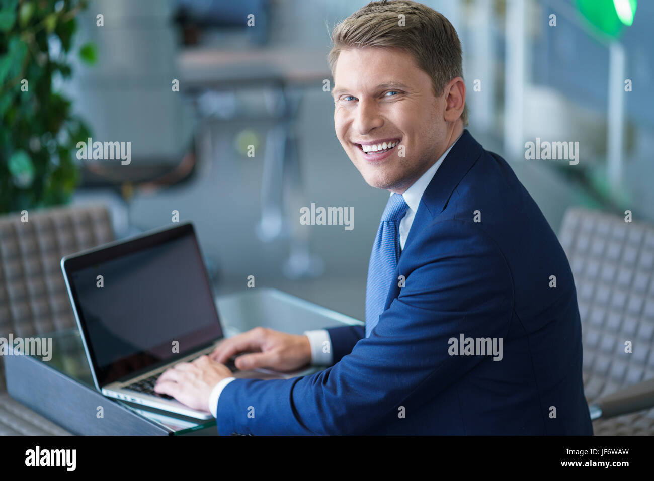 Man with laptop Stock Photo - Alamy