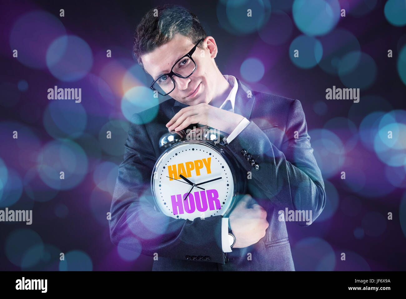 Businessman in happy hour concept Stock Photo - Alamy
