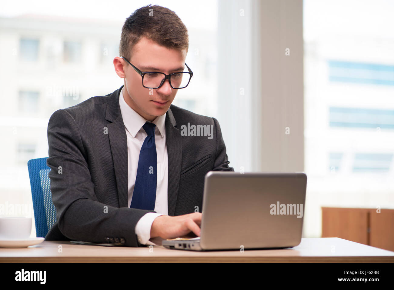 Businessman working with much paperwork Stock Photo - Alamy