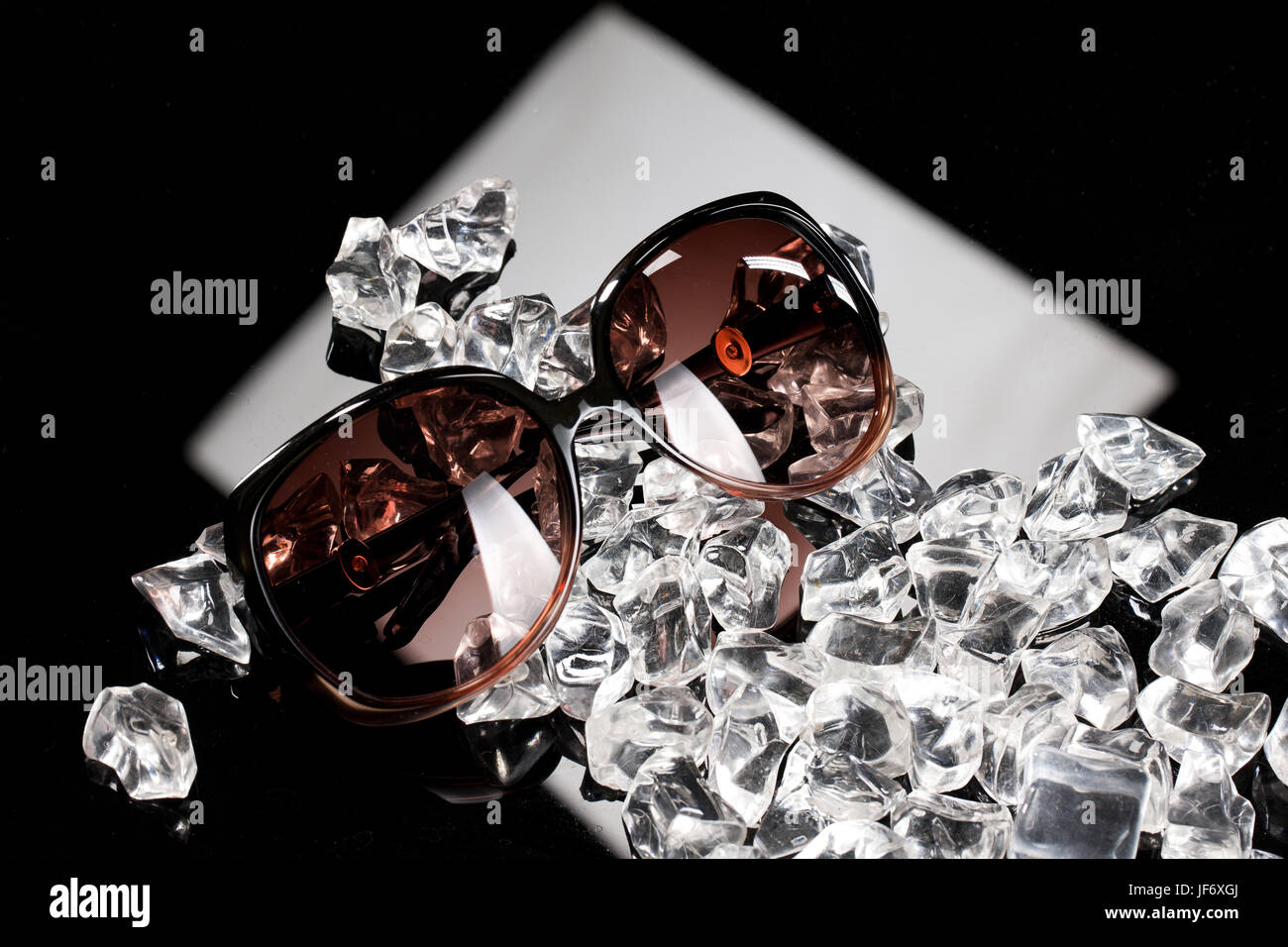 Sunglasses And Ice Stock Photo - Alamy