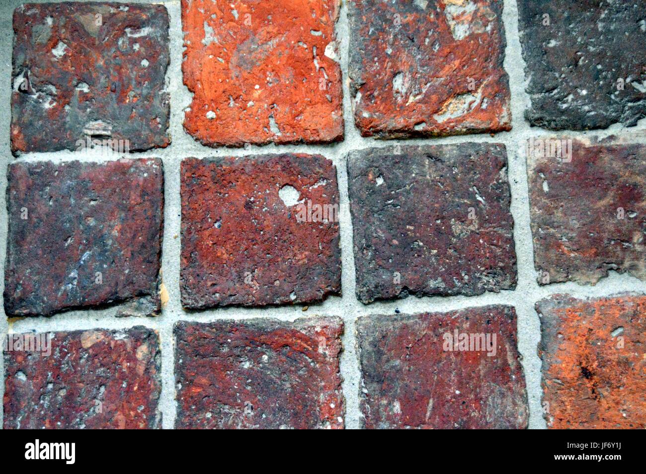 Rows of old red brick used as pavement Stock Photo - Alamy