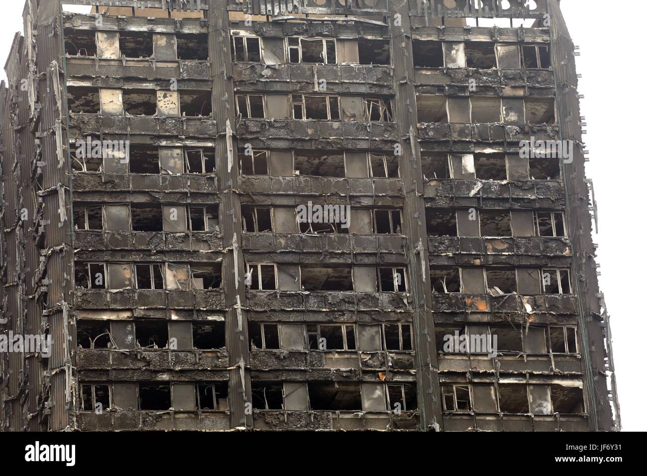 Grenfell Tower burnt out shell and tributes to the dead Stock Photo - Alamy