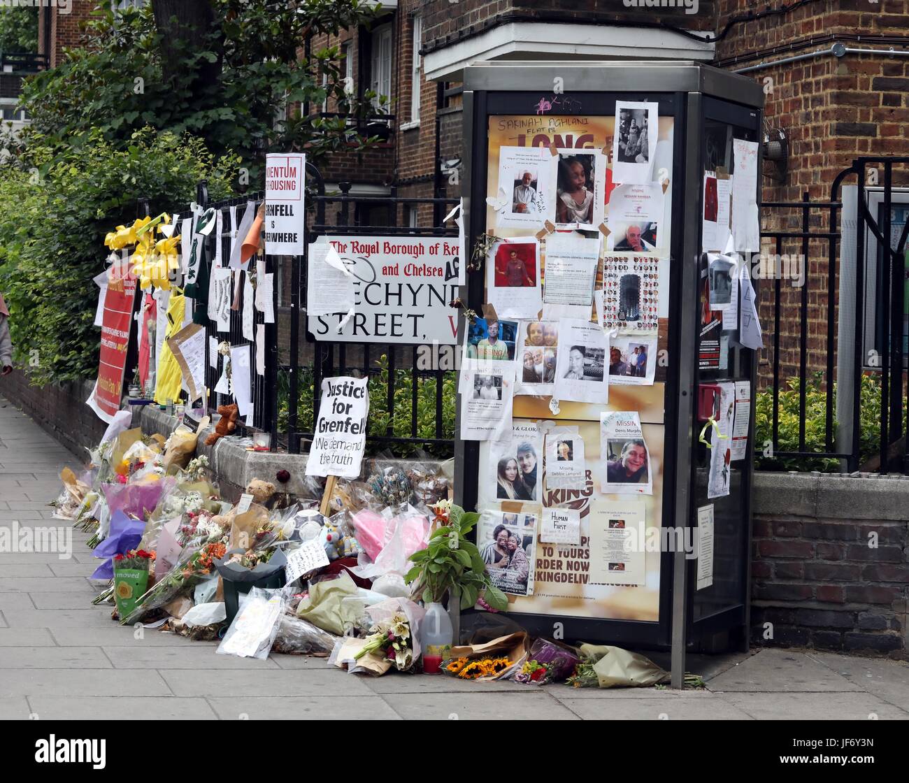 Grenfell Tower burnt out shell and tributes to the dead Stock Photo - Alamy