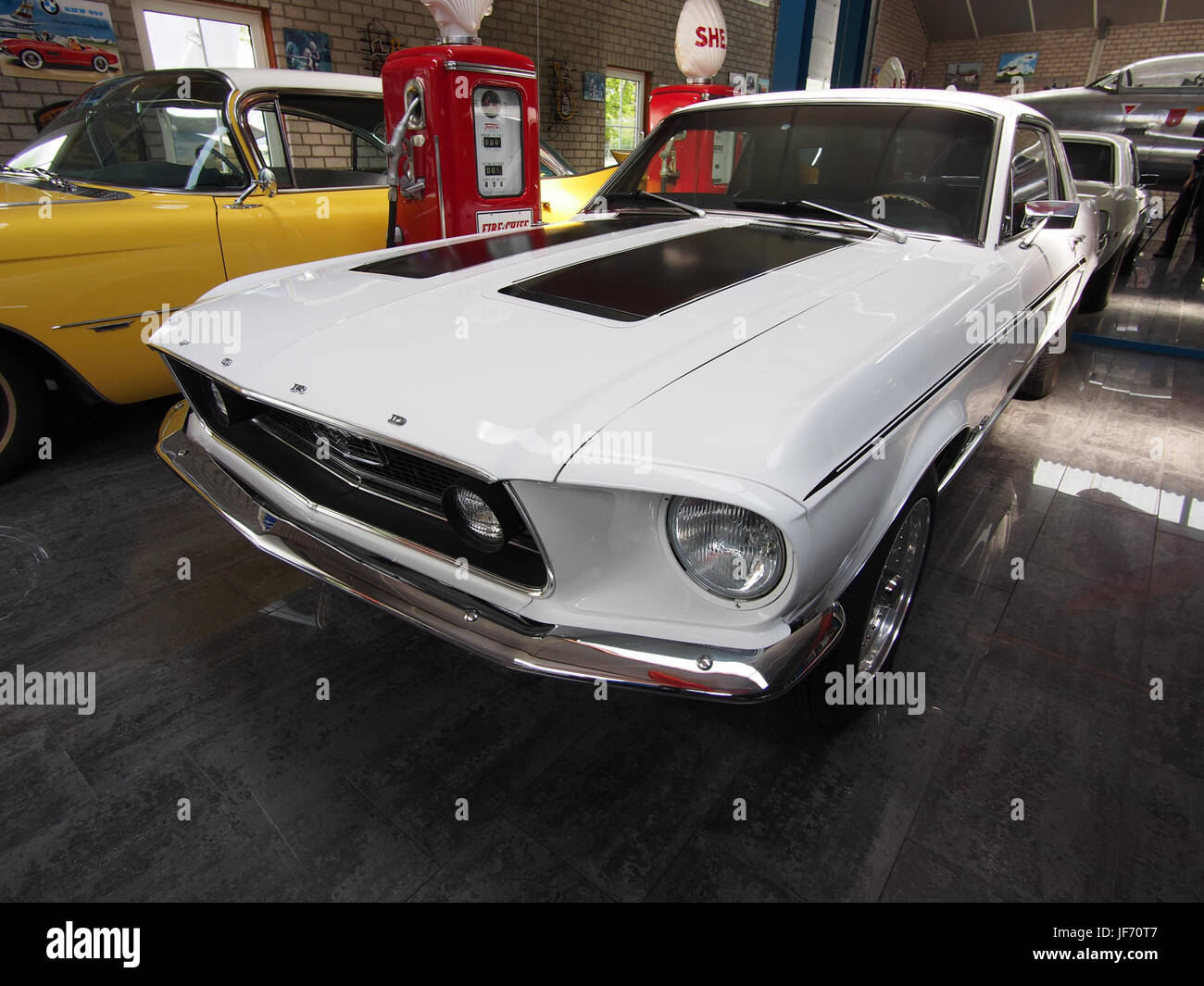 The Ford Mustang, showcased at Piet Smits, is a classic American muscle ...