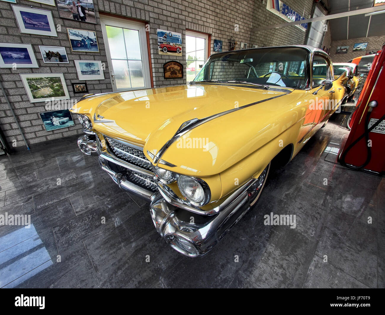 A classic yellow Cadillac, an iconic American luxury car, showcased at ...